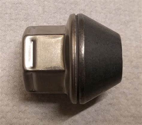 Nakrętki felg aluminiowych Ford Mondeo MK4 7706655085 oficjalne