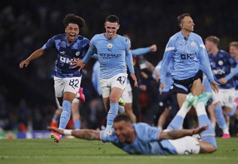 Man City Hang Tough To Beat Inter And Complete The Treble Reuters