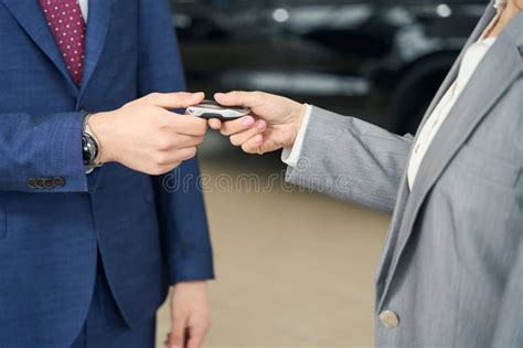 Business People In Suits Holding Car Key In Hands Stock Photo Image
