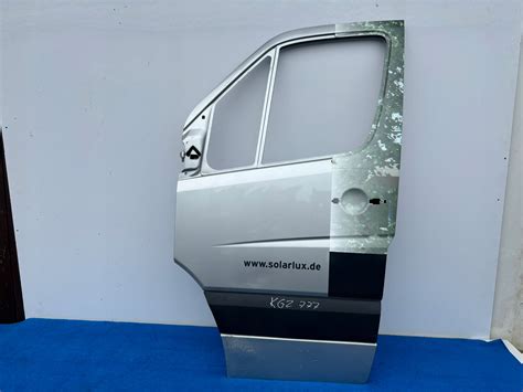 MERCEDES SPRINTER W906 CRAFTER LEWE DRZWI PRZÓD 2E0831051 KGZ777