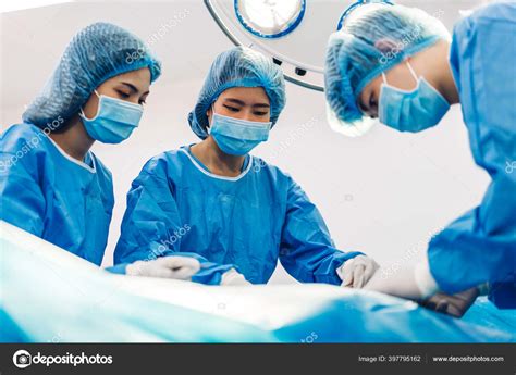 Professional Anesthesiologist Doctor Medical Team Assistant Preparing