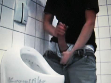 Jerking Huge Cock At Public Toilet
