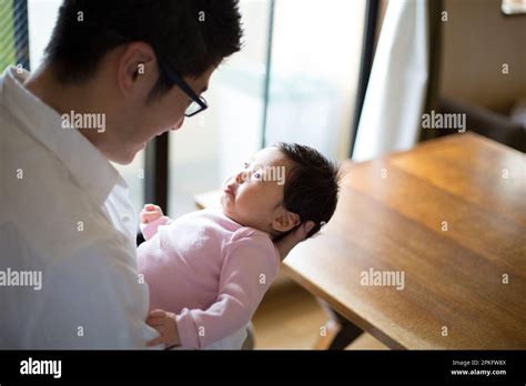 Father Holding Baby Stock Photo Alamy