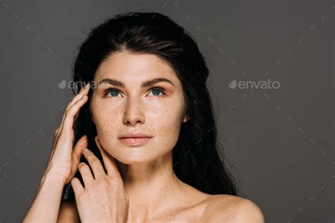 Beautiful Naked Girl With Freckles On Face Isolated On Grey Stock Photo