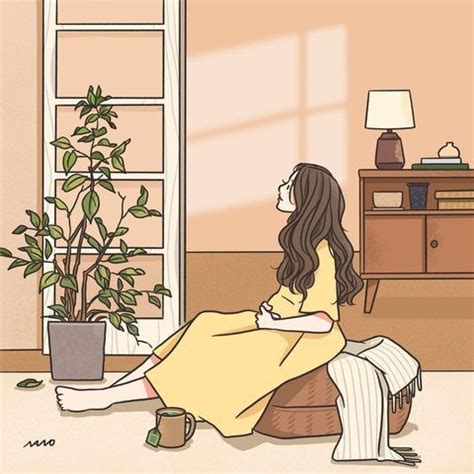 A Woman Sitting On The Floor Next To A Potted Plant