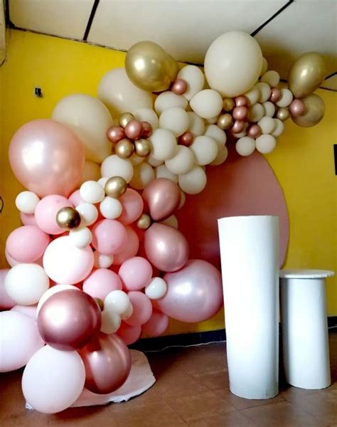 Palo de rosa y globos Arena Palo de rosa Globos Decoración de unas