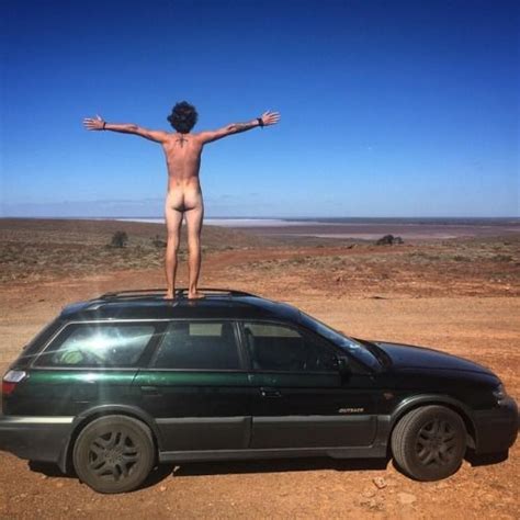 Standing On His Car Naked In The Middle Of Nowhere Scrolller