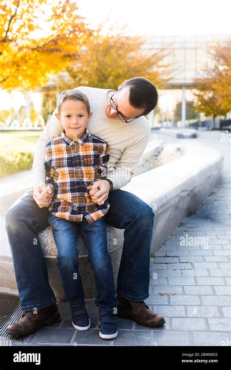Father And Son Pose Together For Portraits Stock Photo Alamy