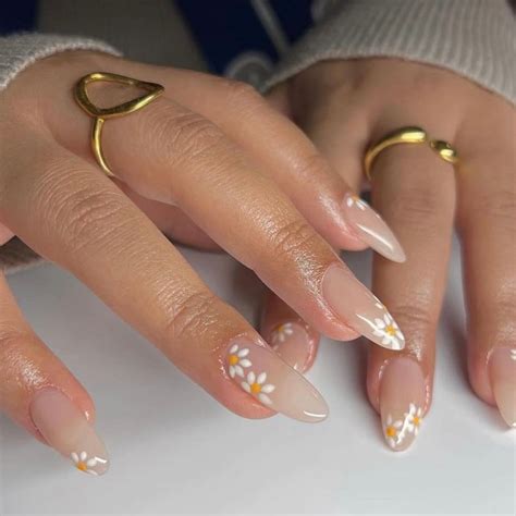 Hawaii Almond Shaped Nude Nails With Hawaiian Delicate Flowers On Top