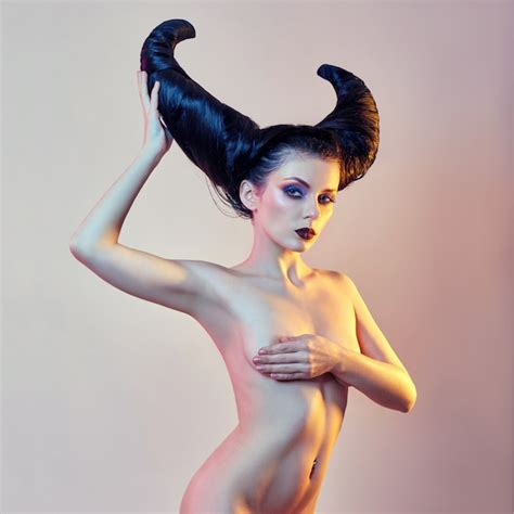 Premium Photo Nude Art Woman With Hair In The Form Of Horns A Female