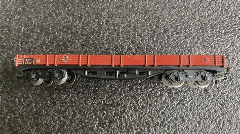 Märklin 4514 DB 4 achsiger langer Niederbordwagen 496391 Kaufen auf