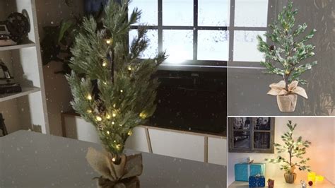 Un sapin de Noël artificiel prêt à l usage neige déco et guirlande