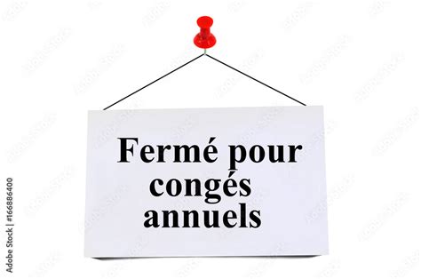 Carton sur lequel est écrit fermé pour congés annuels Photos Adobe Stock