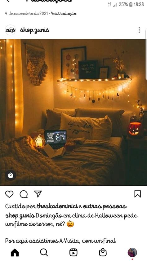 A Bed Room With Lights On The Wall And A Laptop Computer Sitting On Top