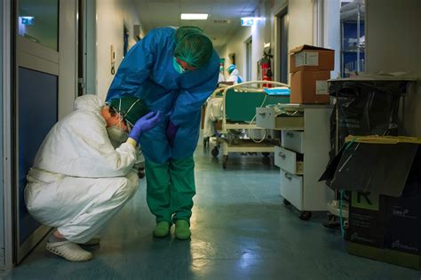 The Defining Photos Of The Pandemic And The Stories Behind Them