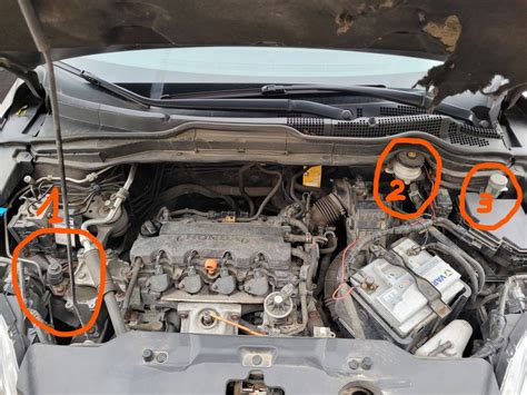 Rozwiązano Honda CR V III 2011 RE5 lokalizacja zbiorniczka płynu