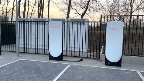 Tesla Brings Futuristic Looking V4 Supercharger Stalls With CCS Plugs