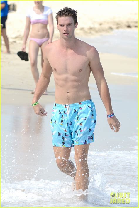 Patrick Schwarzenegger Shirtless Beach Football Photo