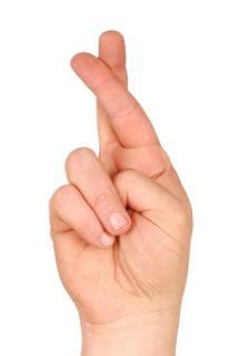 A Hand Making The Number One Sign With Its Fingers