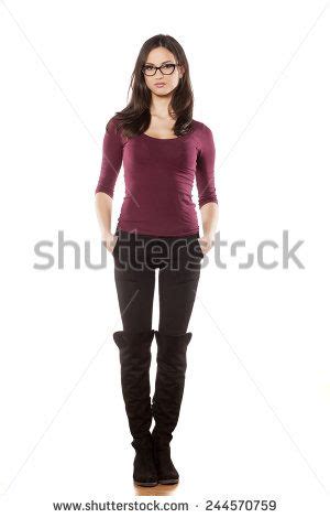 Botas Mujer Fotos imágenes y retratos en stock Woman standing Women
