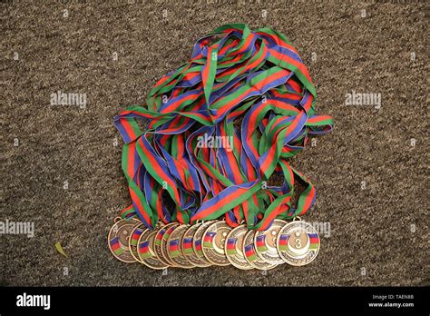 Gold Medal On Black Background Gold Medals With Numbers Three Sport