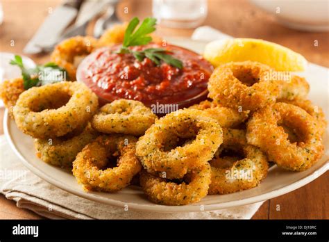 Homemade Fried Breaded Calamari With Marinara Sauce Stock Photo Alamy