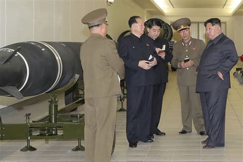 Kim Jong Uns Display Of North Korea Nuclear Warheads Sends Chilling
