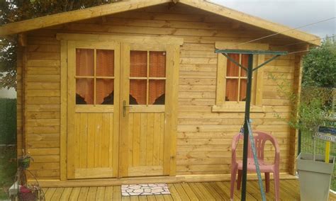 Abri en bois massif 12m² 28mm Traité teinté marron Gardy Shelter