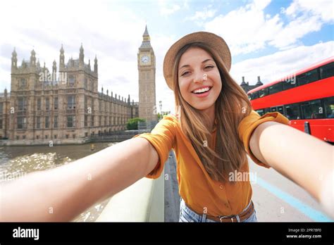 Smiling Tourist Girl Taking Self Portrait In London Uk Selfie Photo Of Happy Woman Traveling