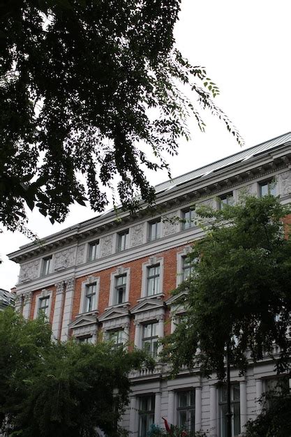 Premium Photo A Building With Trees In The Background