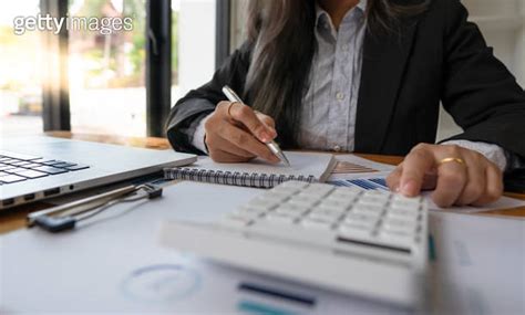 Business People Or Accountants Are Analyzing Graphs On Finance