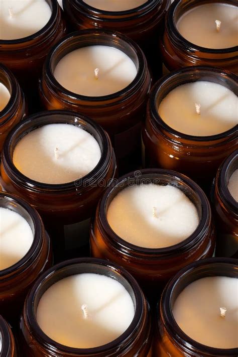 Group Of Handmade Soy And Coconut Wax Candles In A Amber And Opaque