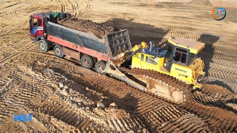 Shantui Bulldozer Pushing Dump Truck Unloading Dirt Stuck Beautiful