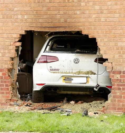Four In Hospital After Car Crashes Through House Wall Into Living Room