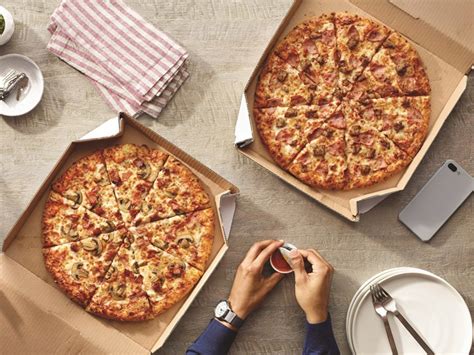 Dominos Offers 50 Off All Menu Priced Pizzas Ordered Online Through