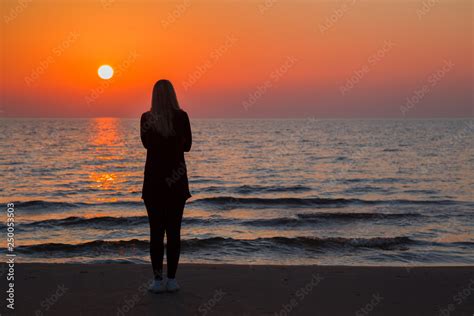 Female Silhouette Standing Back