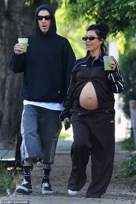 Pregnant Kourtney Kardashian Proudly Displays Her Bare Baby Bump