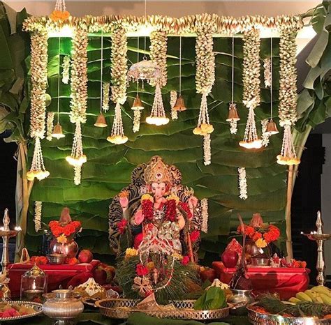 Love The Backdrop Created With Banana Leaves And Flower Hangings