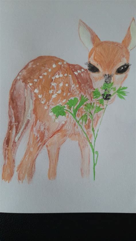 A Drawing Of A Fawn With Leaves In It S Mouth And Eyes Standing Next