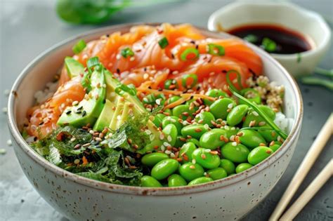 Premium Photo Fresh Salmon Poke Bowl With Edamame Seaweed Avocado Granola