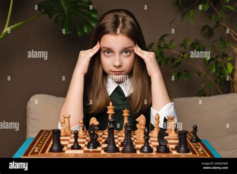 Portrait Thoughtful Schoolgirl Chess Player Serious Female Teen Sitting At Chessboard Young