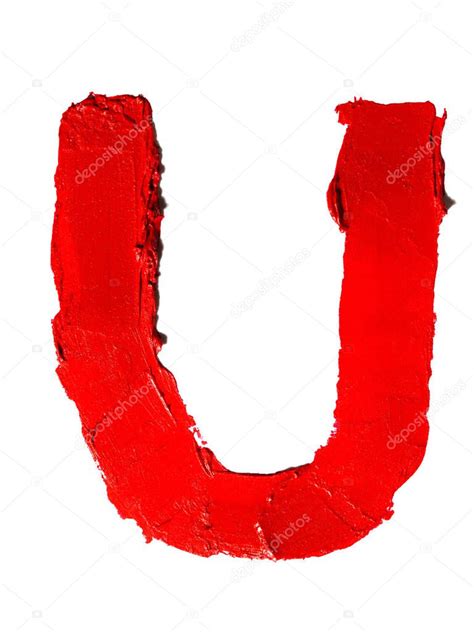 Letra mayúscula inglesa grande manuscrita U hecha de lápiz labial rojo