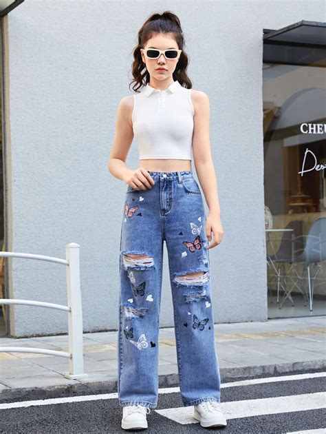 SHEIN Teen Girls Butterfly Print Ripped Straight Leg Jeans SHEIN USA