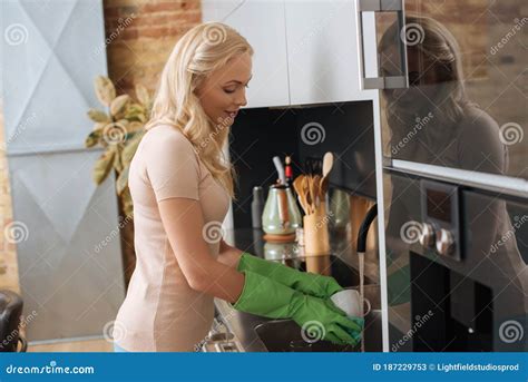 Young Housewife In Rubber Gloves Washing Stock Image Image Of Casual Faucet 187229753