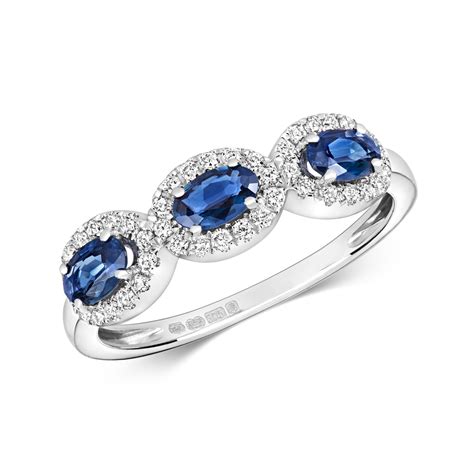 9ct White Gold Oval Triple Sapphire And Round Brilliant Cut Diamond
