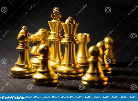Chess Pieces In Gold On A Black Background Stock Image Image Of