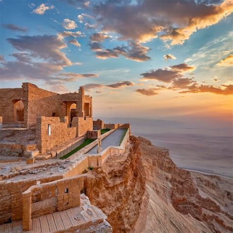 Premium AI Image Beautiful Sunrise Over Masada Fortress Ruins Of King