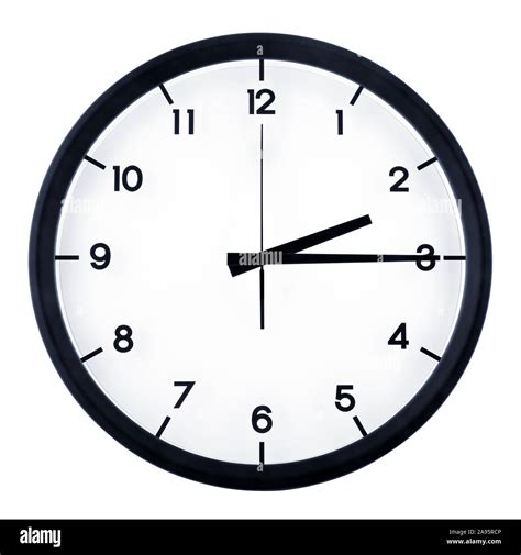 Classic Analog Clock Pointing At Two Fifteen O Clock Isolated On White