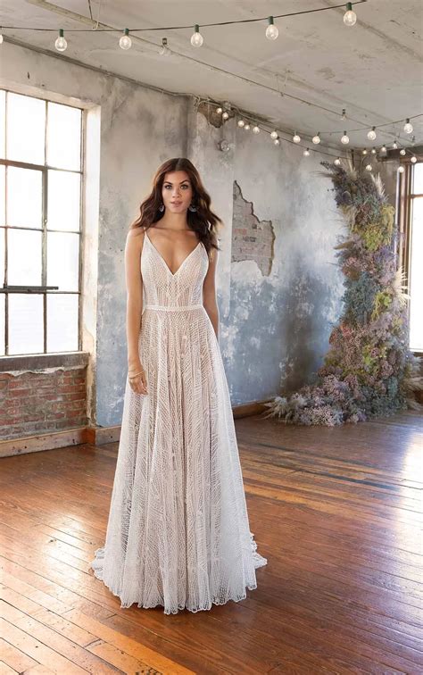 Edgy Lace Boho A Line Wedding Dress With Plunging Neckline And