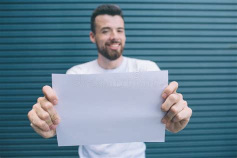 Person Holding Blank Paper